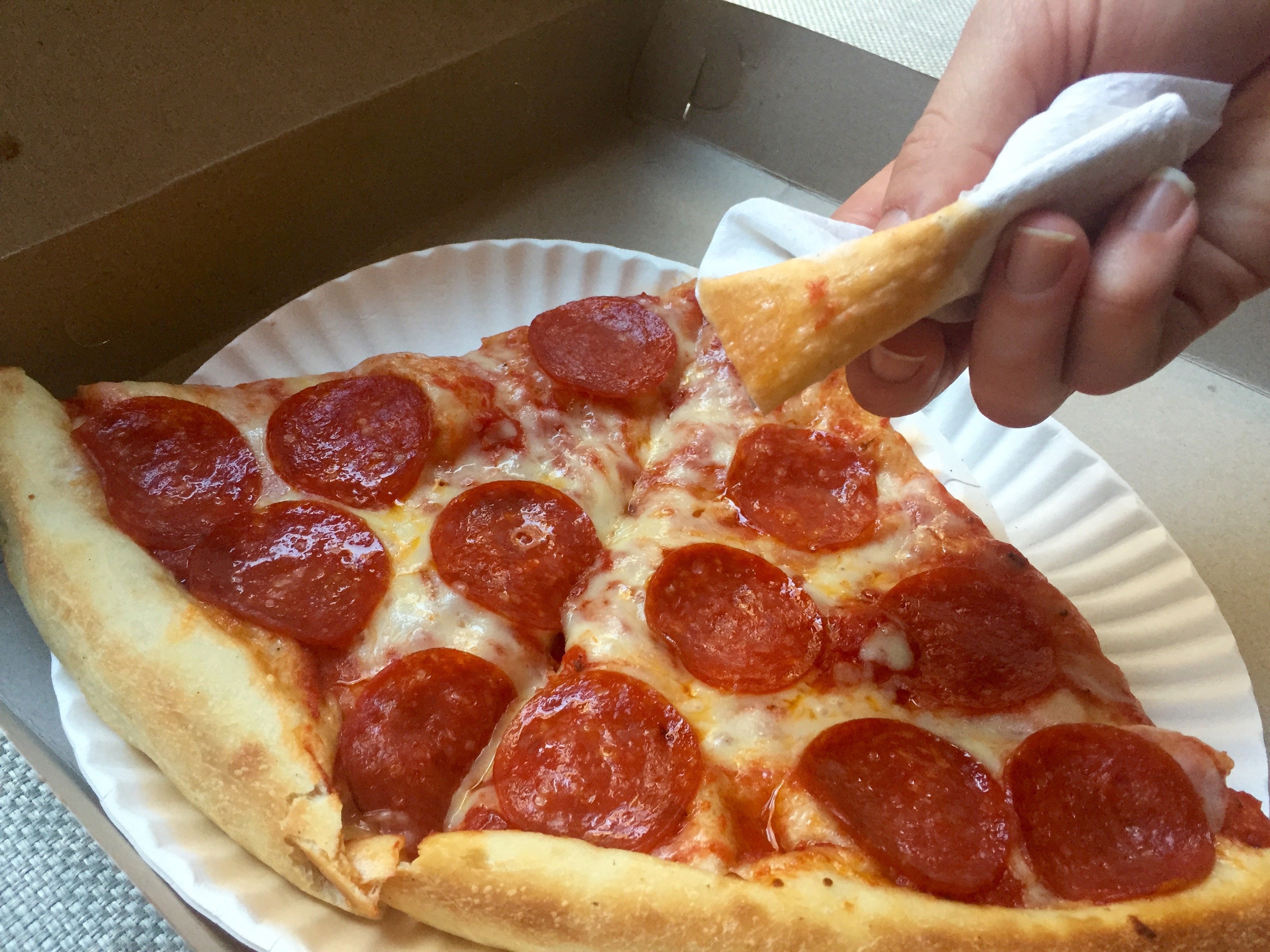 how to make a pizza less greasy